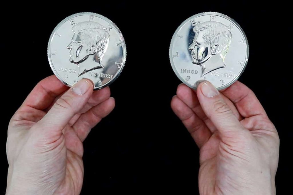 How To Roll A Coin Across Your Knuckles & Vanish - Coin Magic Tricks